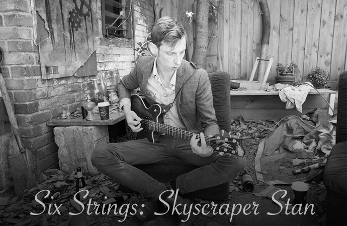 SIX STRINGS: Skyscraper Stan | POST TO WIRE